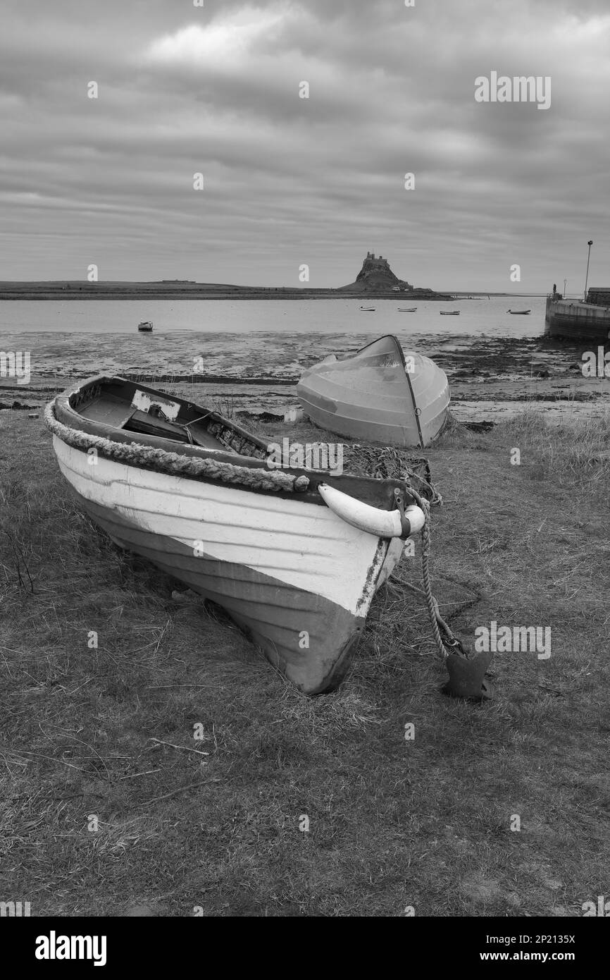 Black and White image of a Rowing Boat in a Harbor at Lindisfarne, Holy ...