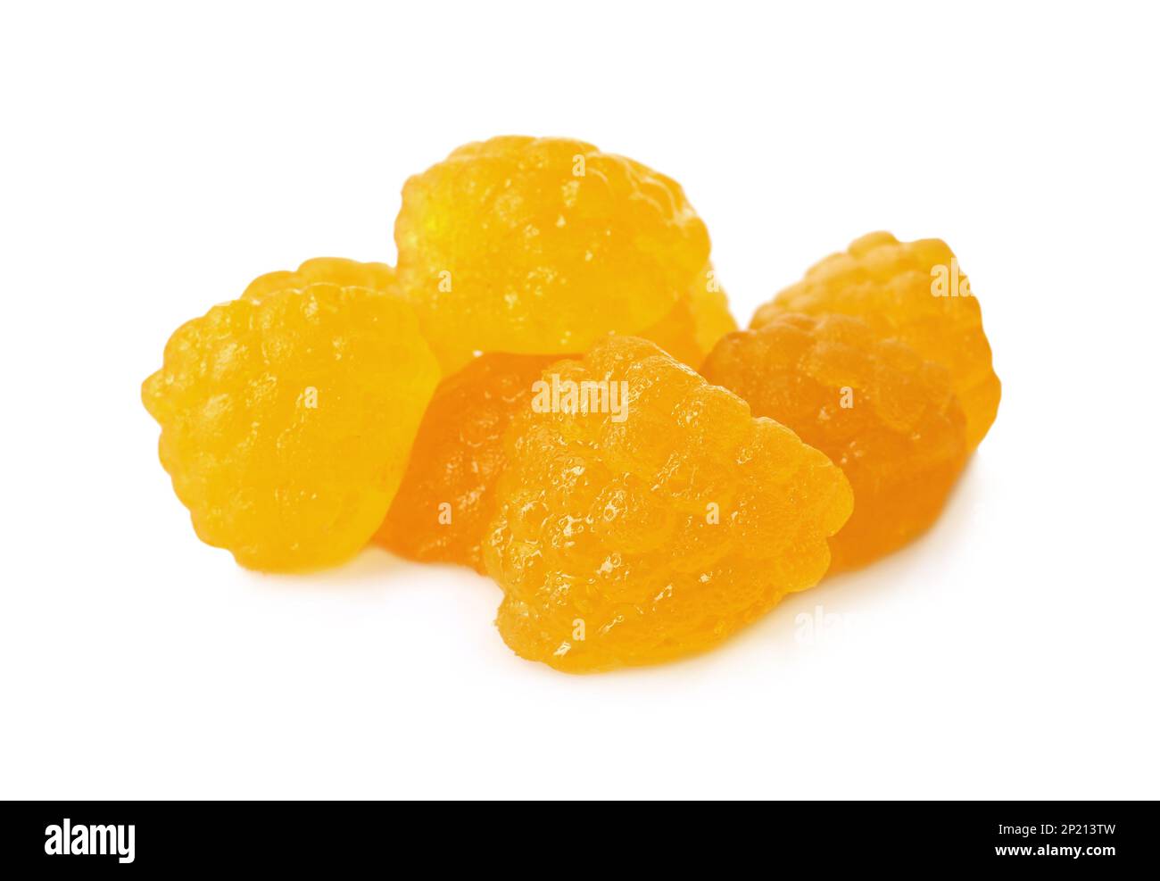 Delicious gummy golden raspberry candies on white background Stock ...