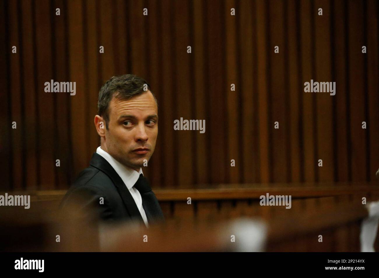 Oscar Pistorius sits in the dock at a courtroom of the North Gauteng ...