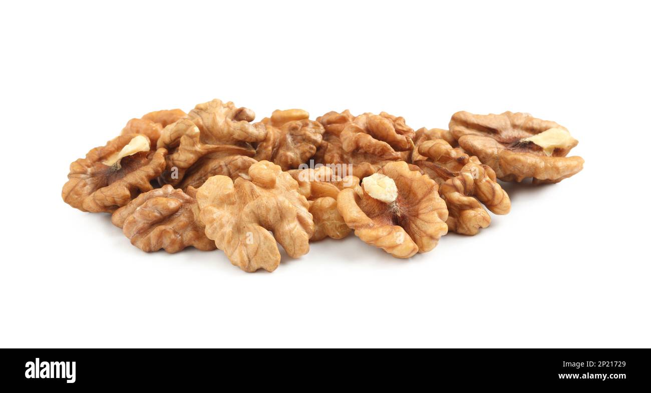 Pile of peeled walnuts on white background Stock Photo - Alamy