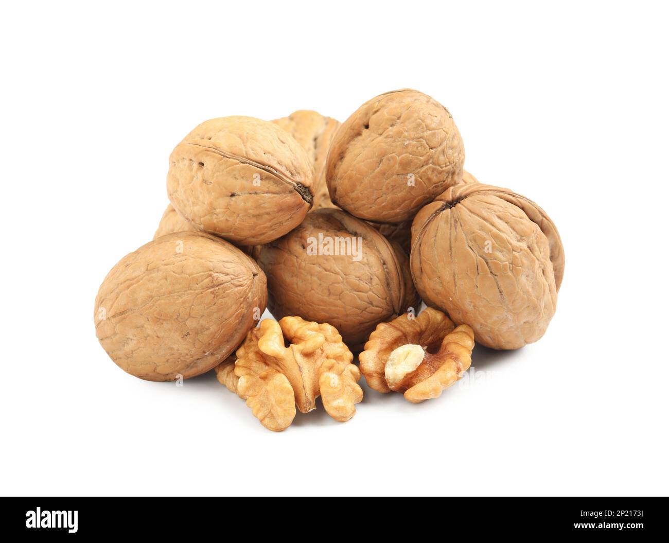 Pile of ripe walnuts on white background Stock Photo - Alamy