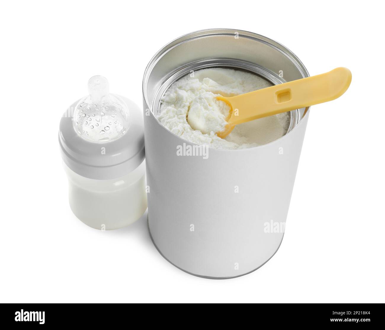 Blank can of powdered infant formula with feeding bottle and scoop on ...