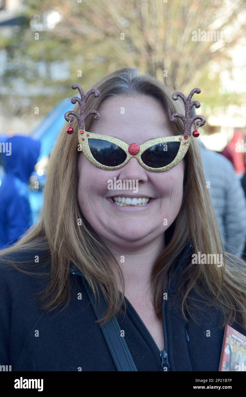 Stacey Bates of Newton, Mass. sports some holiday glasses featuring ...