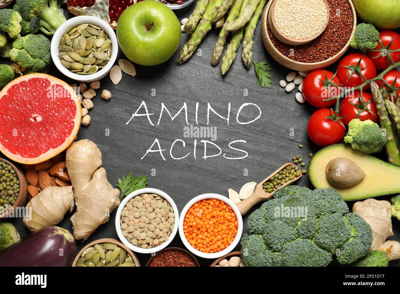 Frame of fresh vegetables, fruits and seeds on black table, flat lay ...