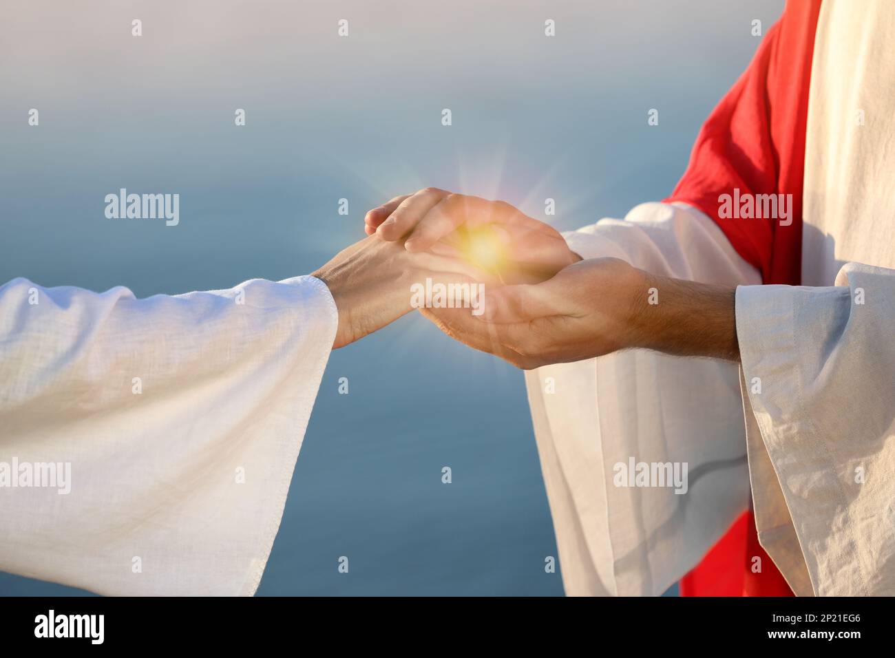 Jesus Christ and woman near water outdoors, closeup. Miraculous light ...