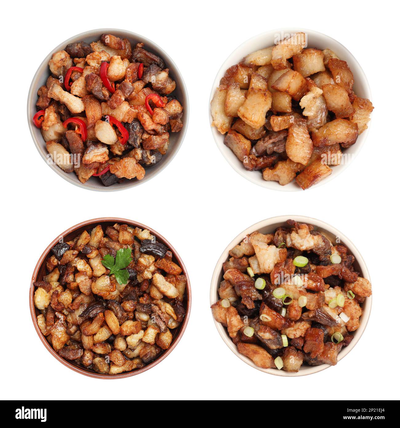 Set with tasty fried cracklings on white background, top view. Cooked ...