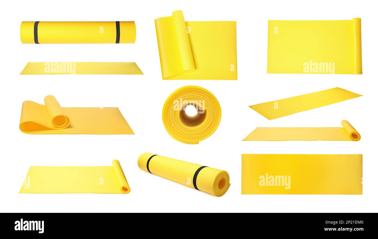 Set with yellow camping mats on white background Stock Photo - Alamy