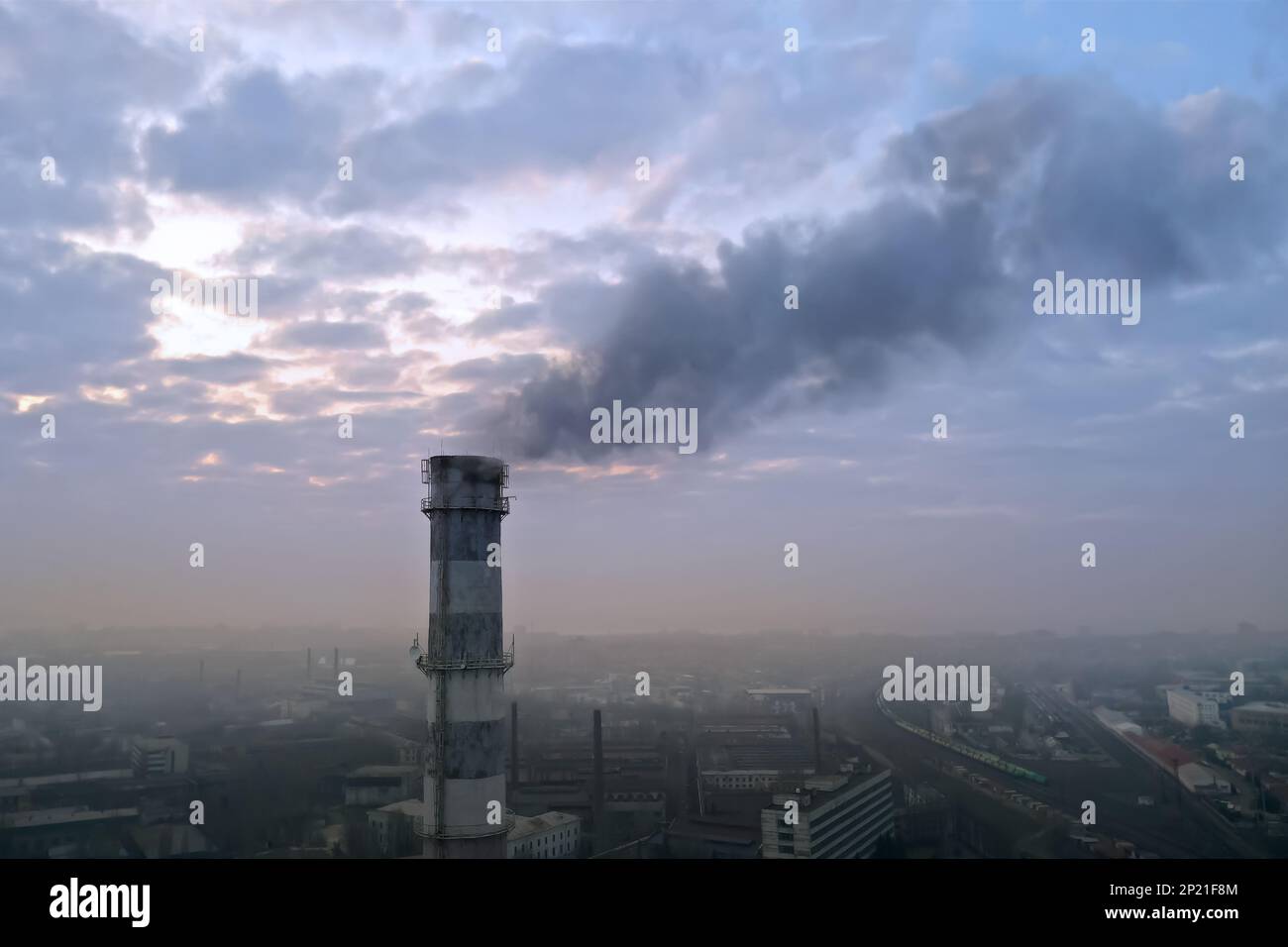 CO2 emissions. Polluting air with smoke from industrial chimney ...