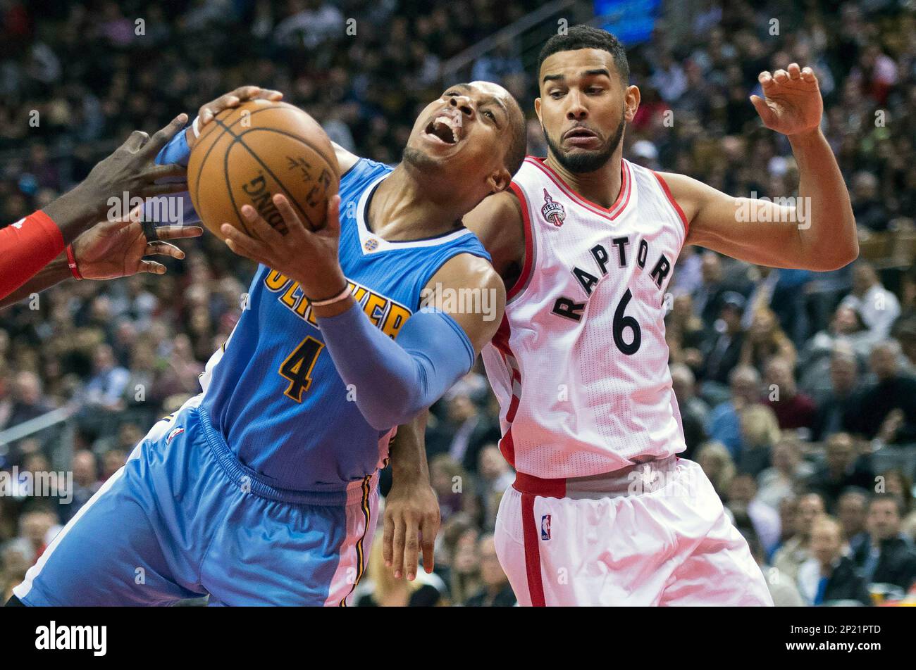 Denver Nuggets guard Randy Foye (4) gets fouled by Toronto Raptors ...