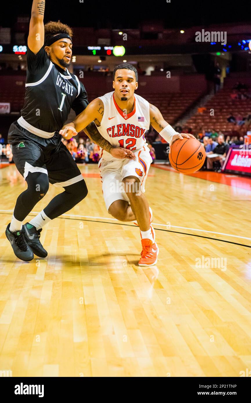 USC Upstate Spartans guard Mike Cunningham (1) defends against Clemson ...