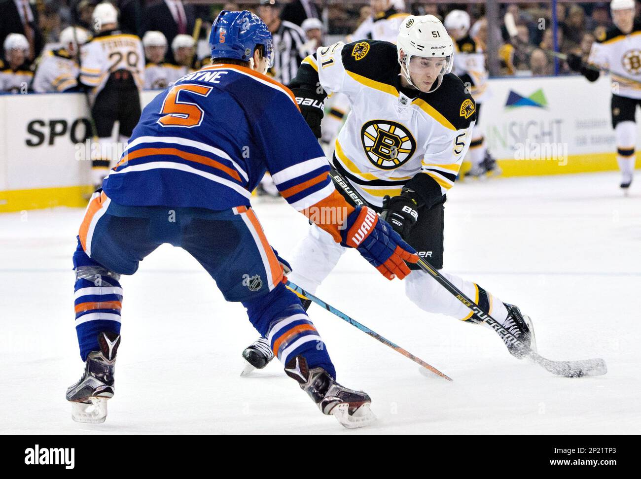 Boston Bruins' Ryan Spooner (51) gets a shot away as Edmonton Oilers ...