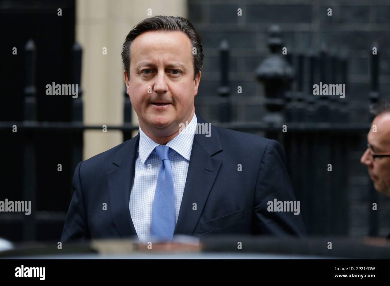 British Prime Minister David Cameron leaves 10, Downing Street in ...