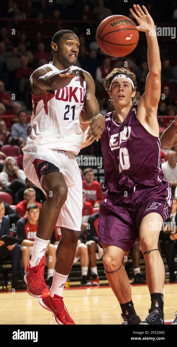 Western Kentucky forward Nigel Snipes (21) passes while guarded by ...