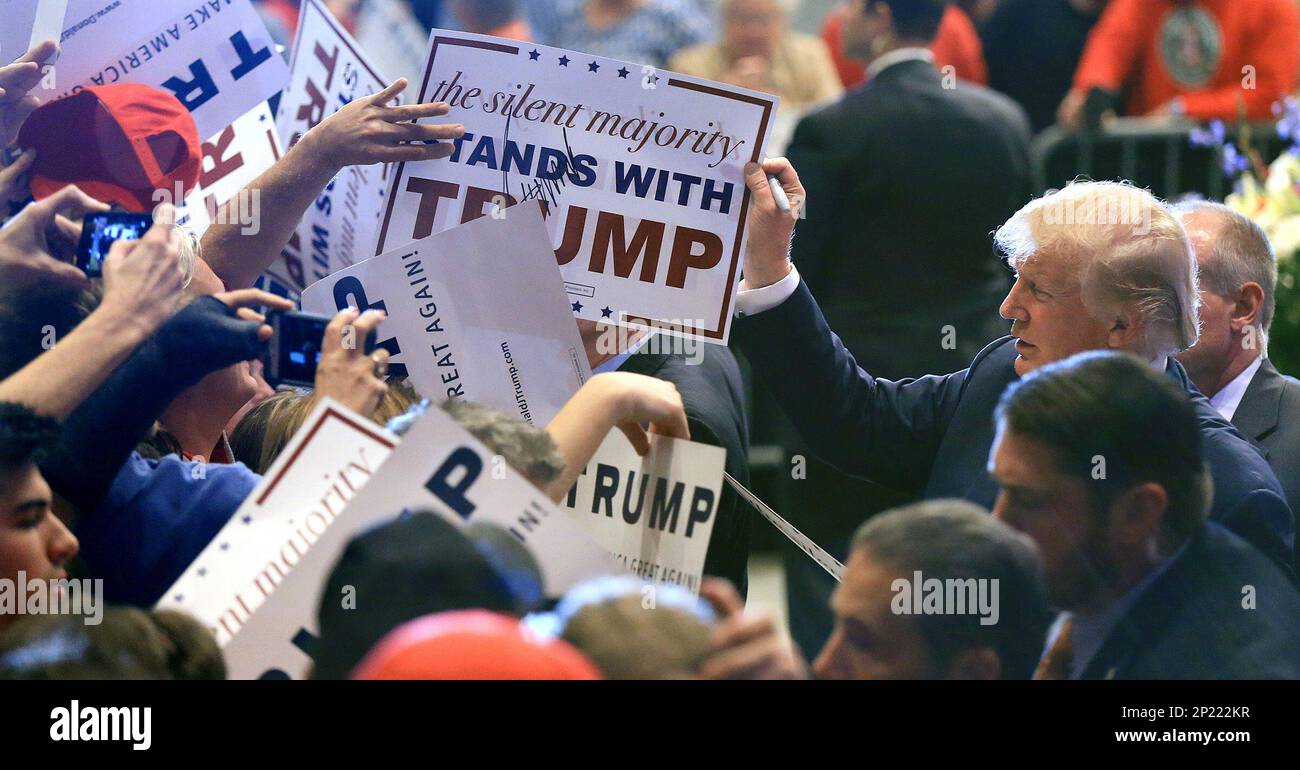 Republican presidential candidate Donald Trump works the crowd at the ...