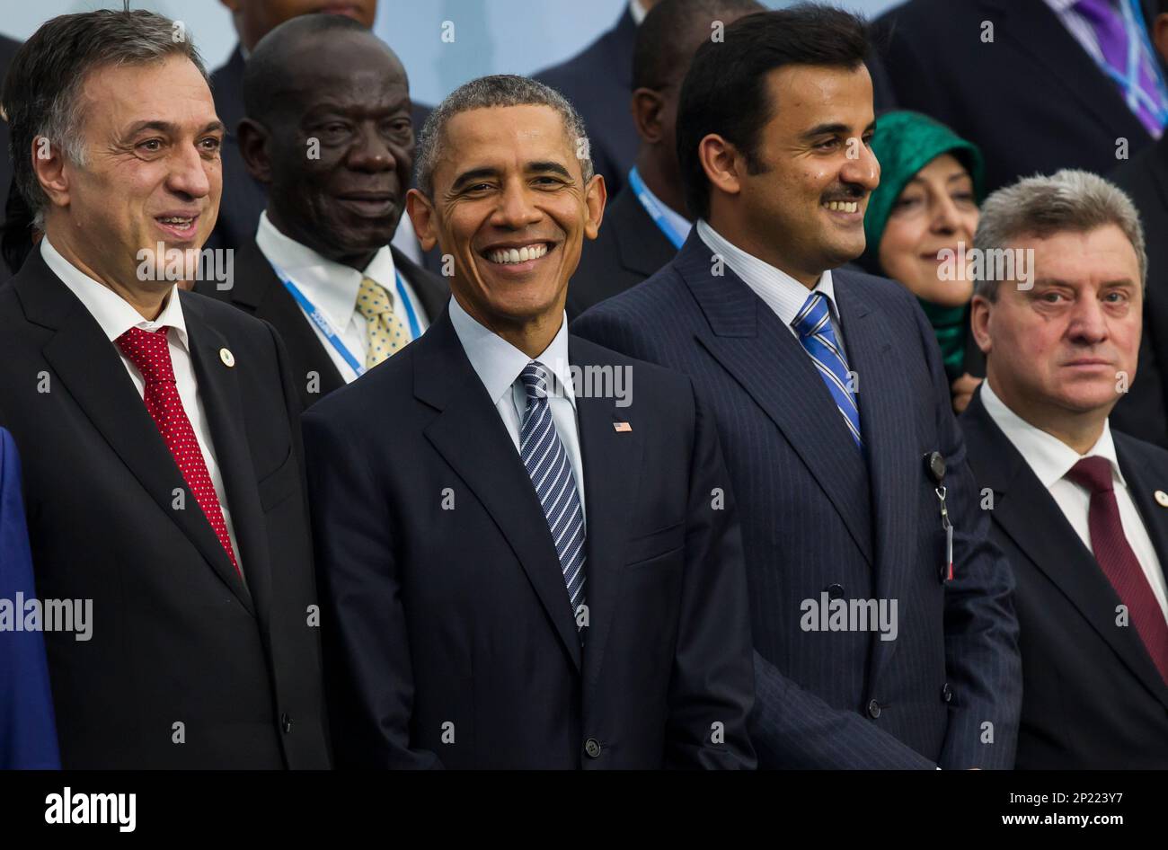 U.S. President Barack Obama, centre left, and other world leaders pose ...