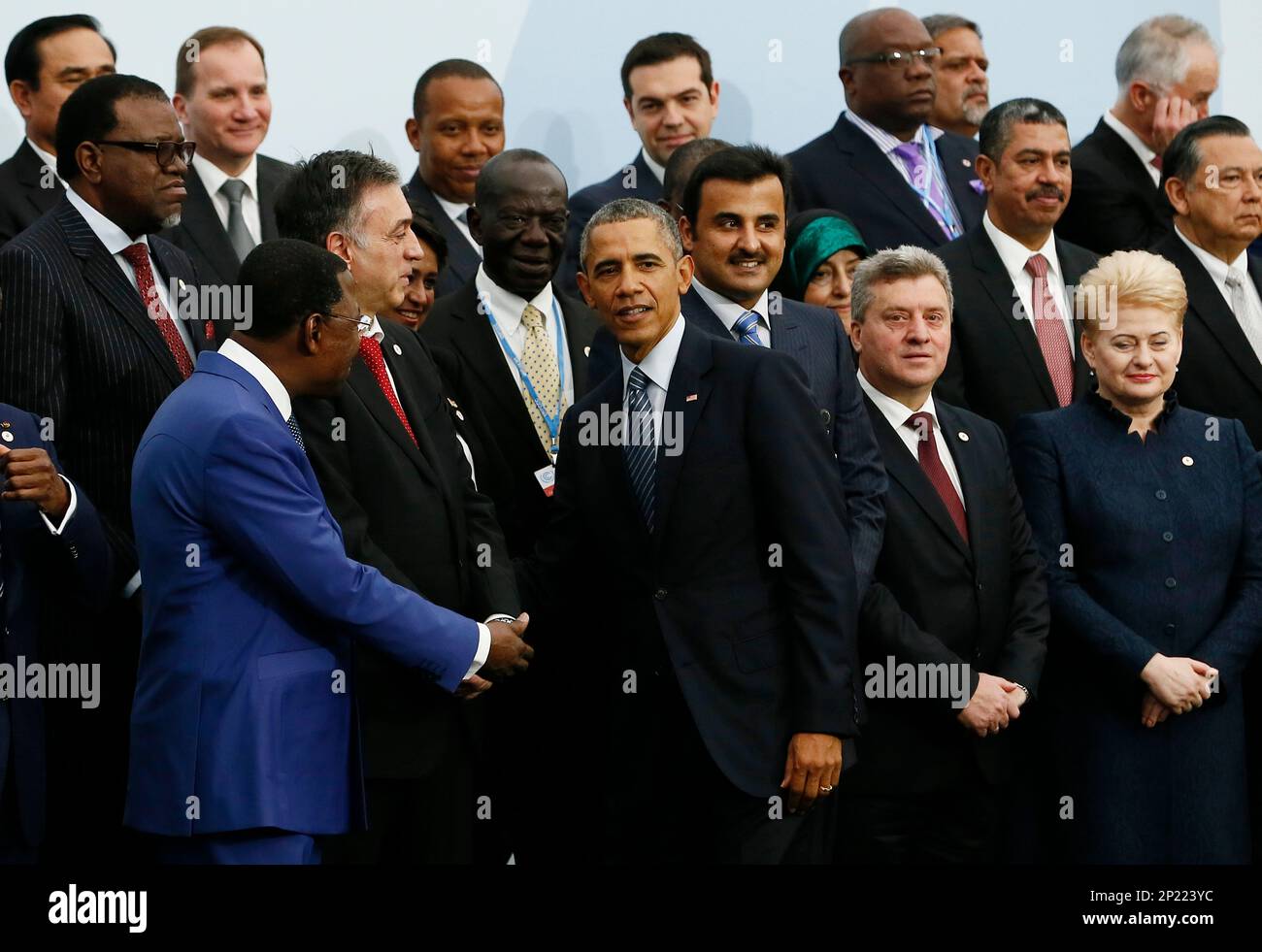 U.S. President Barack Obama, centre, arrives for a group photo as part ...