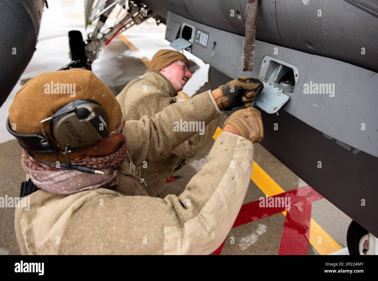 U.S. Air Force Staff Sgt. Nate Maddox and Tech. Sgt. Ryan Keel ...