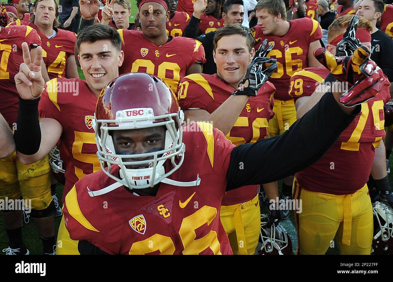 28 November 2015: USC Trojans football players celebrate on the field ...
