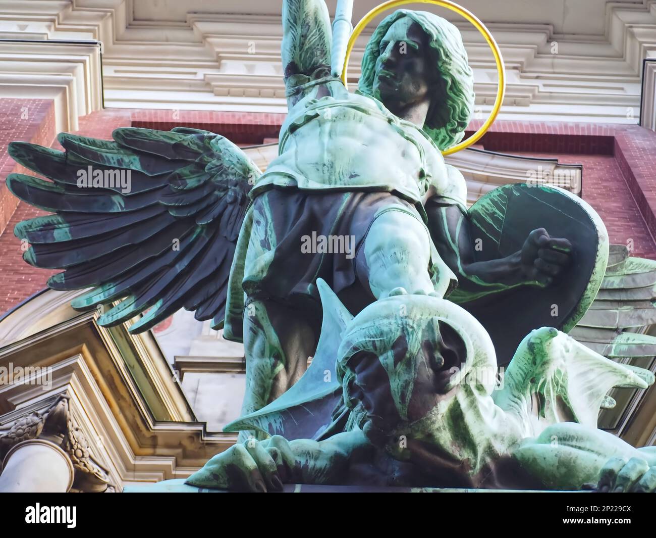 Sculpture of Archangel Michael fighting Satan at St. Michaels Church in ...