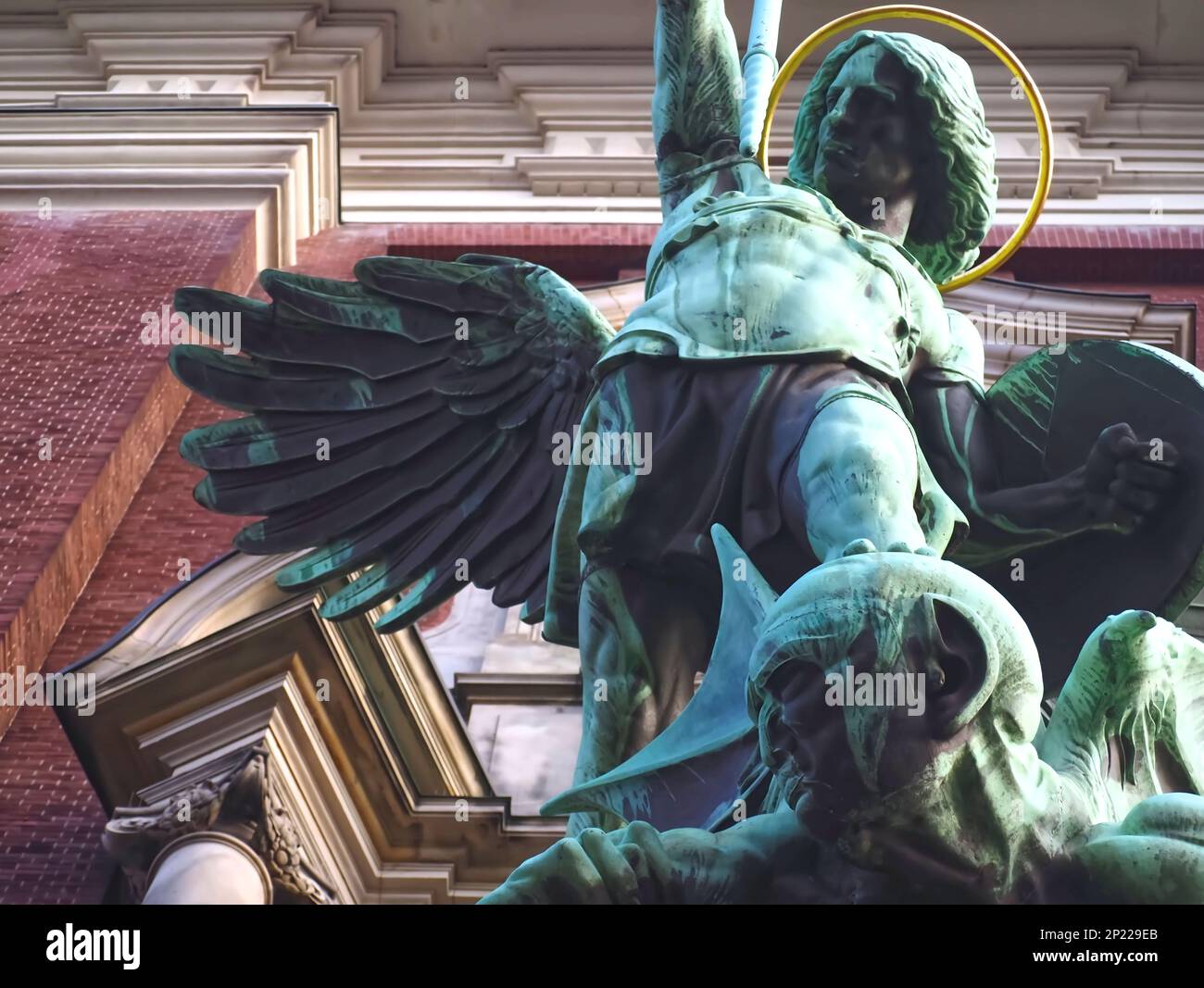 Sculpture of Archangel Michael fighting Satan at St. Michaels Church in ...