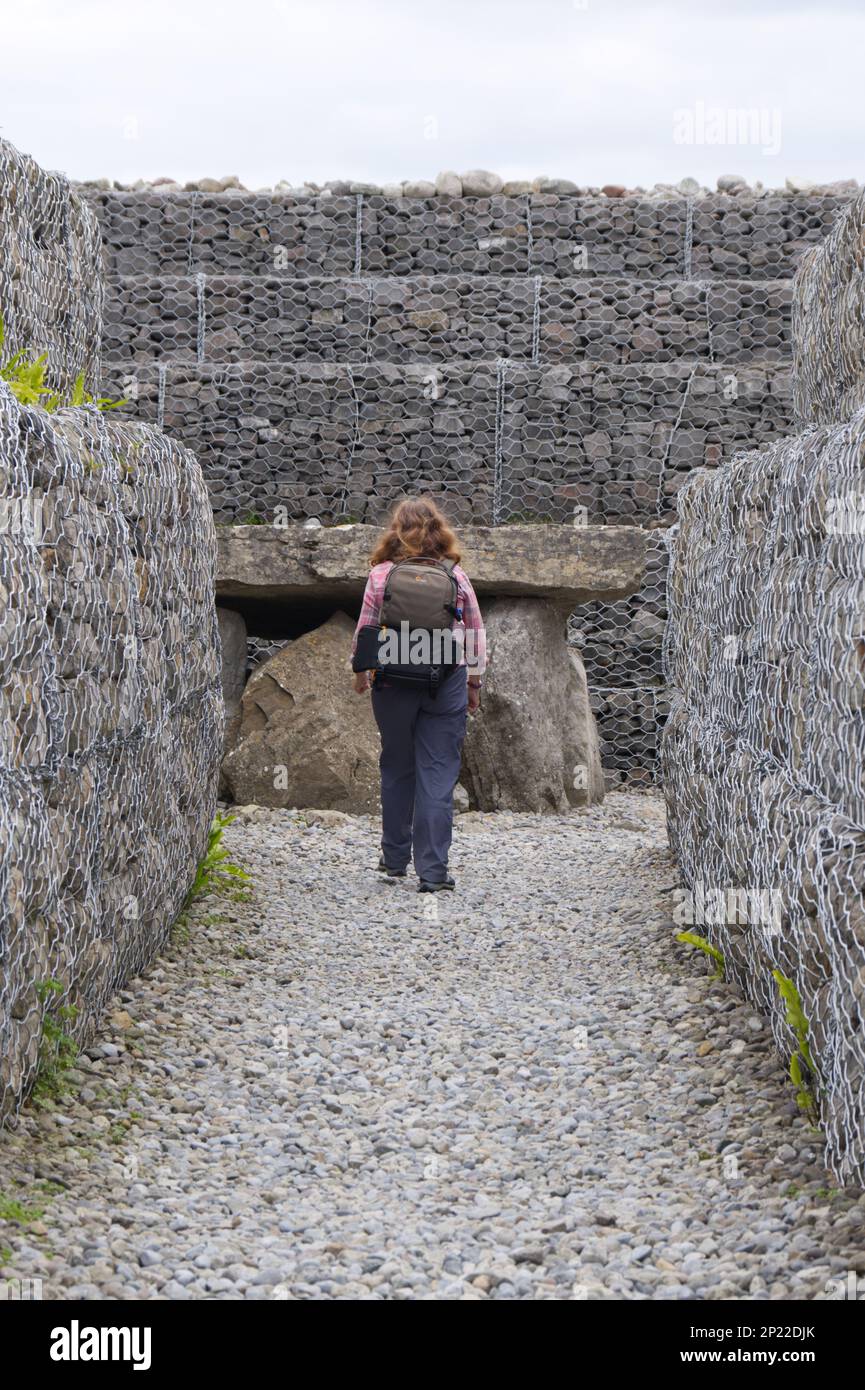 A tourist visiting Carrowmore Megalithic Cemetery EIRE Stock Photo - Alamy