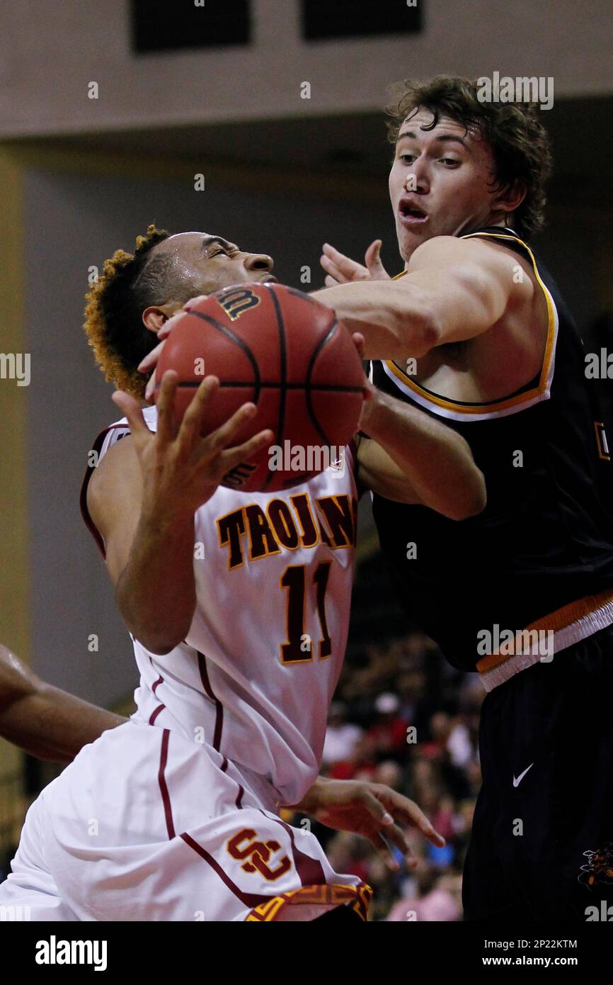 26 November 2015: USC Trojans guard Jordan McLaughlin (11) is fouled by Wichita State Shockers ...