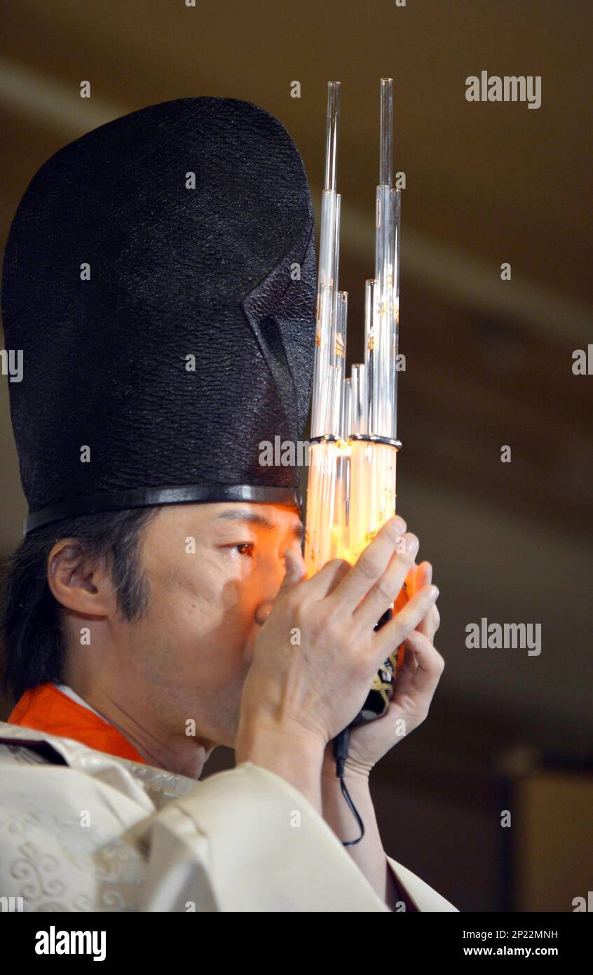 Hideki Togi, Japanese court music gagaku, plays the sho made of glass ...