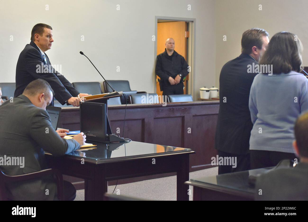 Oneida County District Attorney Scott D. McNamara, left, reacts to ...