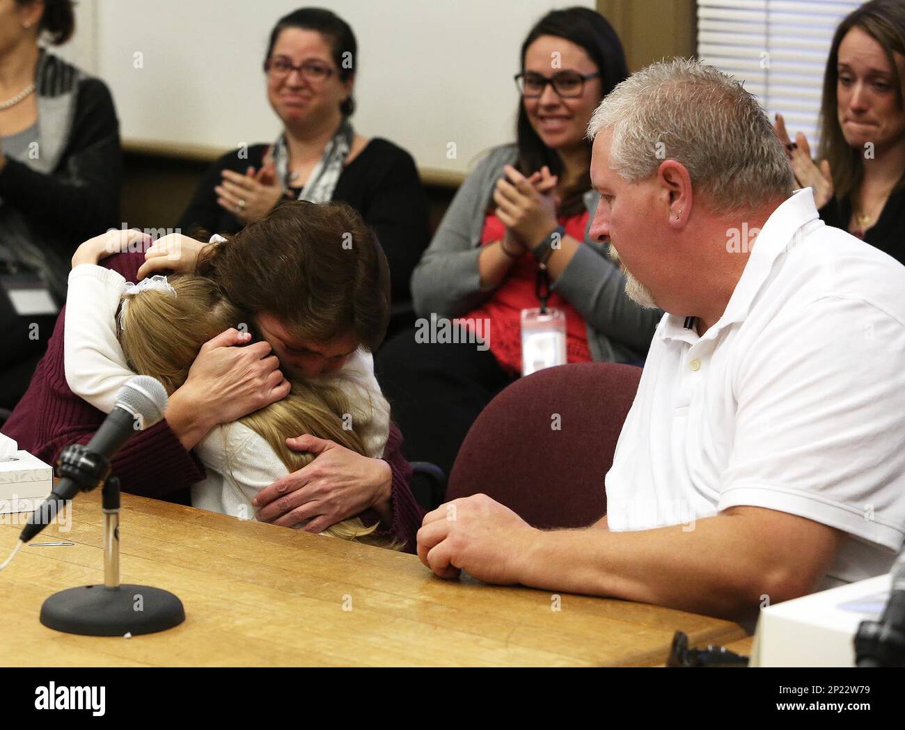 In this Nov. 20, 2015 photo, Tonya Chidester, left, hugs her ...