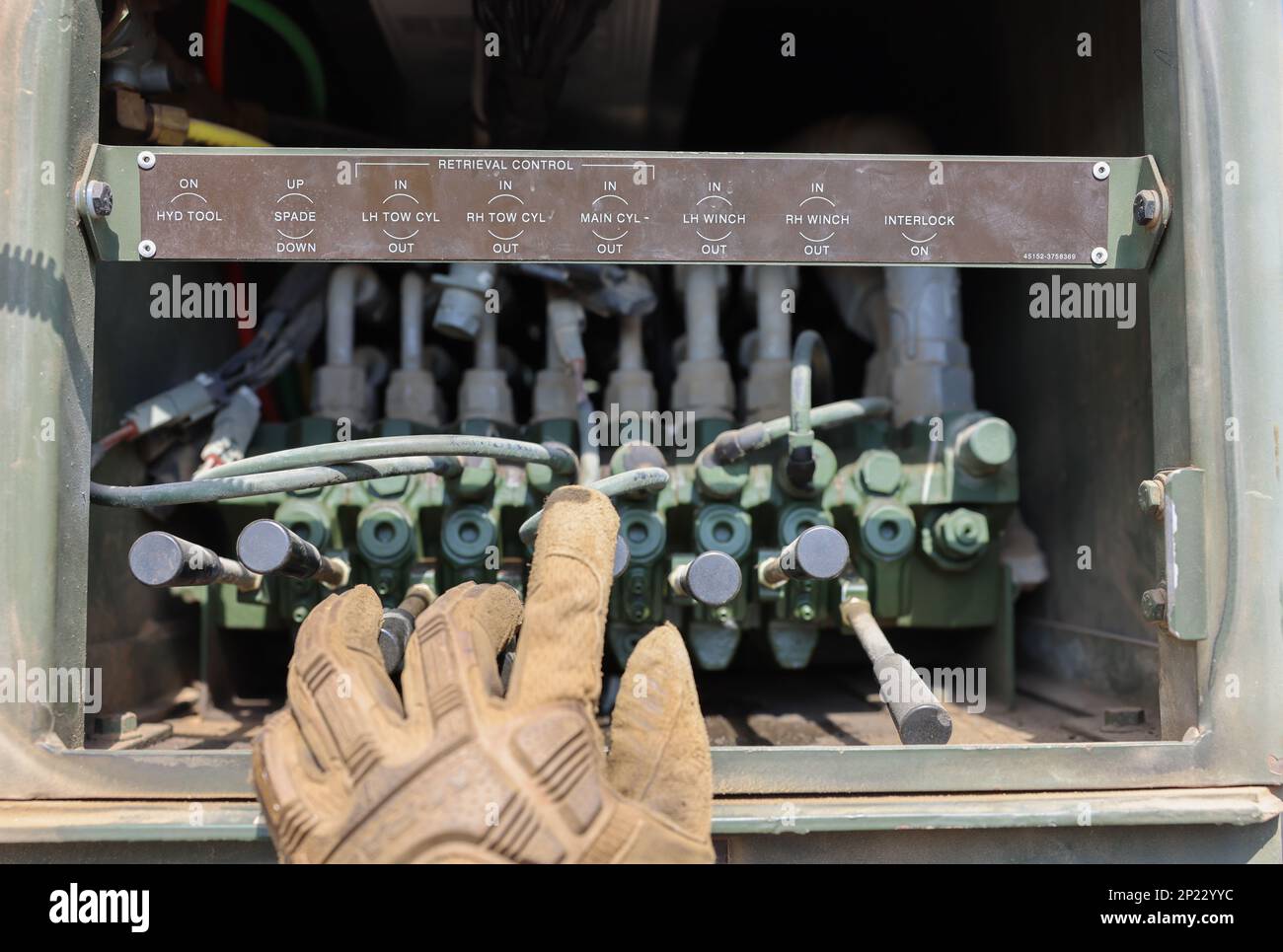 U.S. Marine Corps Cpl. Alvin Hall, a vehicle recovery operator with 9th ...