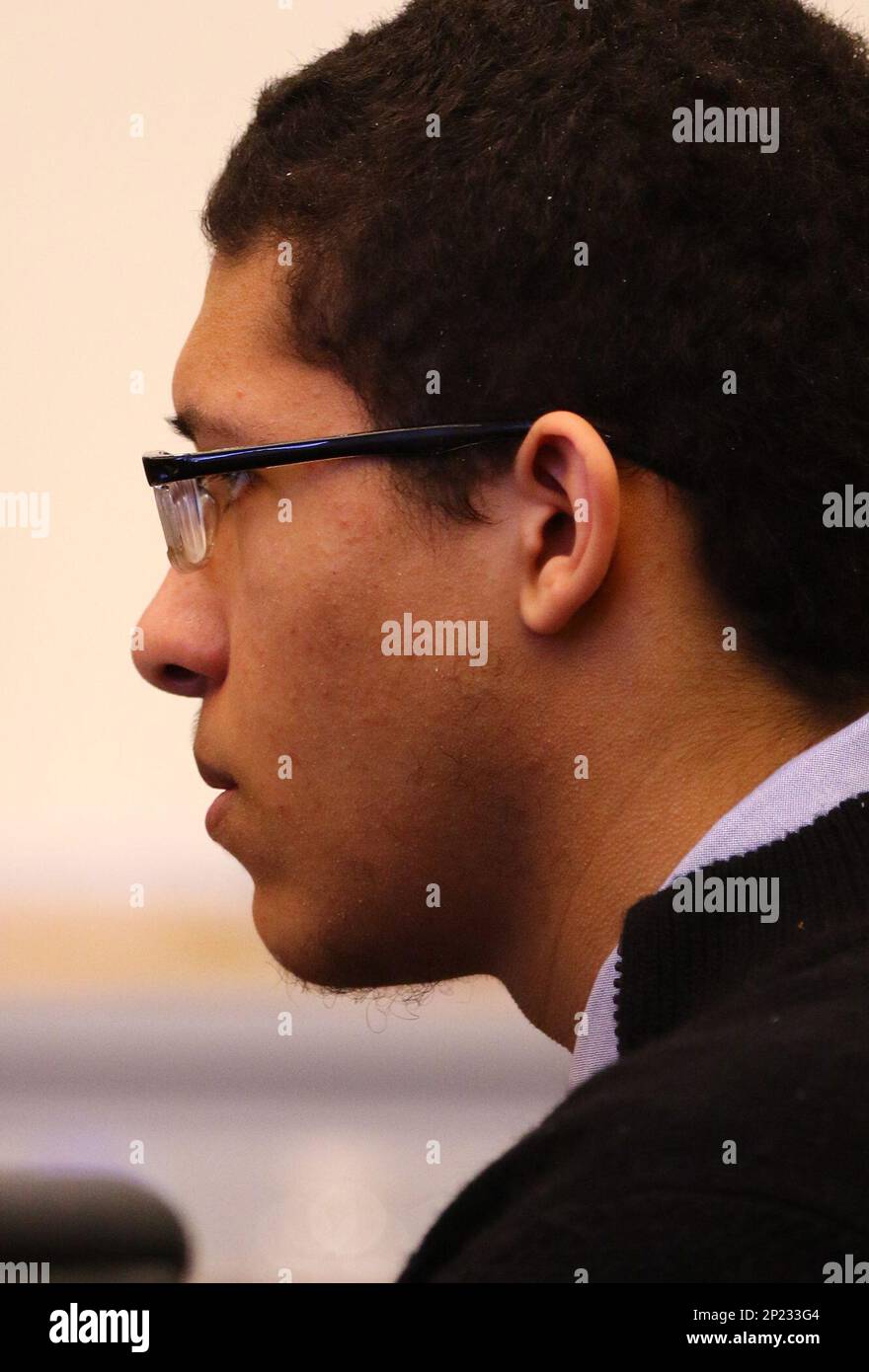 Philip Chism listens during testimony in his murder trial in Salem ...