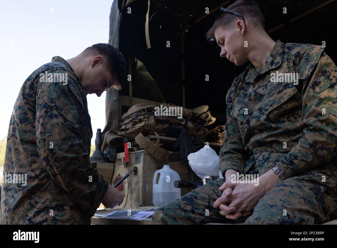 U.S. Marine Corps Sgt. Nash Jones, left, and Cpl. Austin Marshall ...