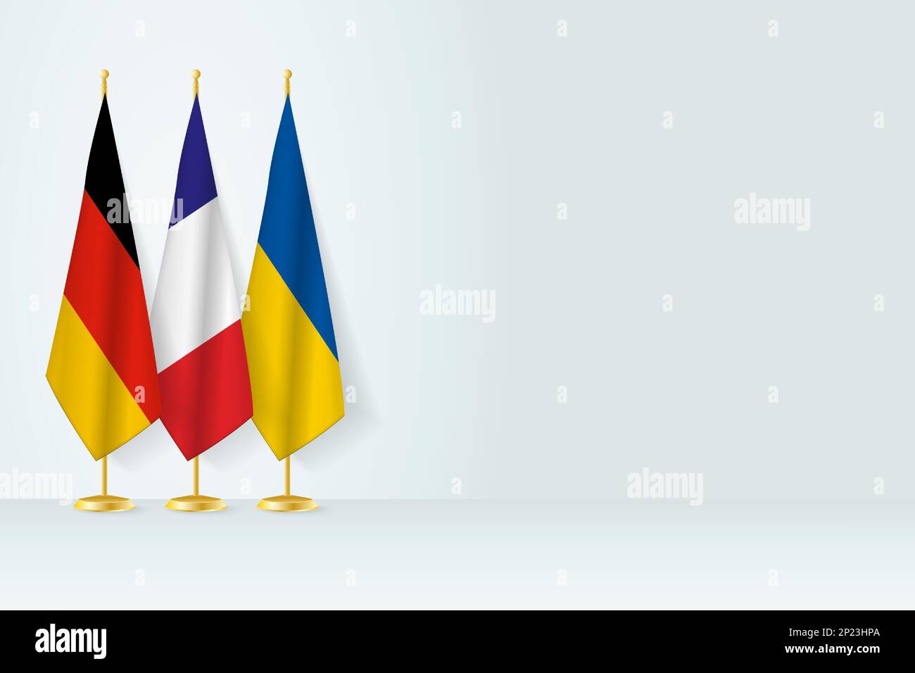 Flags of Germany, France and Ukraine stand in row on indoor flagpole ...