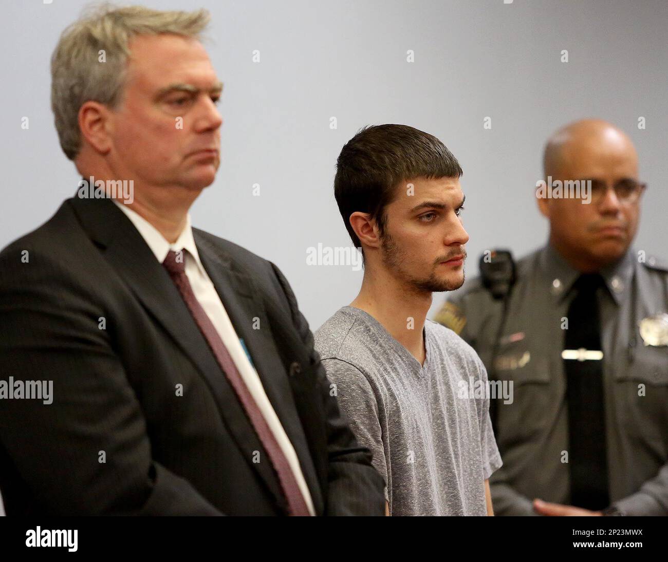 Attorney David Channing, left, stands with his client Michael Fortin ...