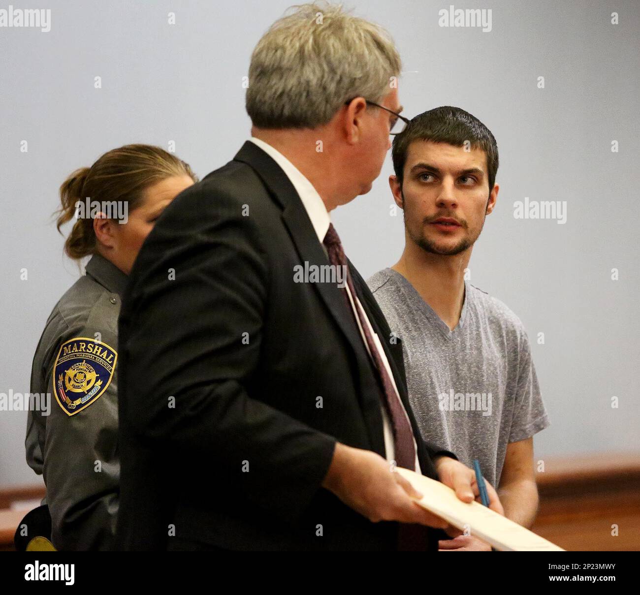 Michael Fortin, right, looks to his attorney David Channing before he ...