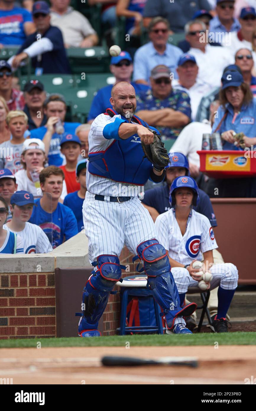 Chicago Cubs catcher David Ross (3) throws to first during a game ...