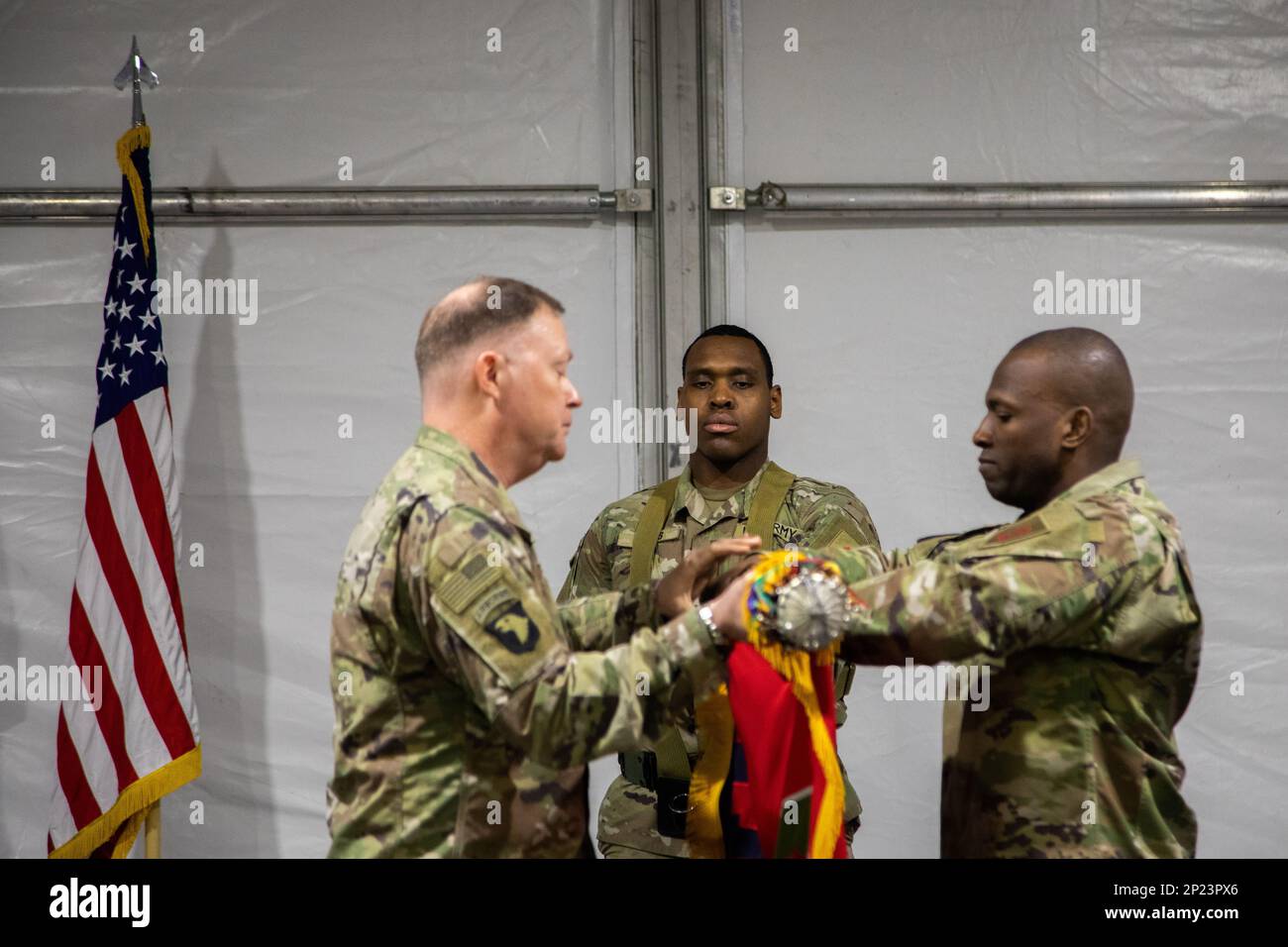 U.S. Army Lt. Col. John C. Hatley, left, commander of Headquarters and ...