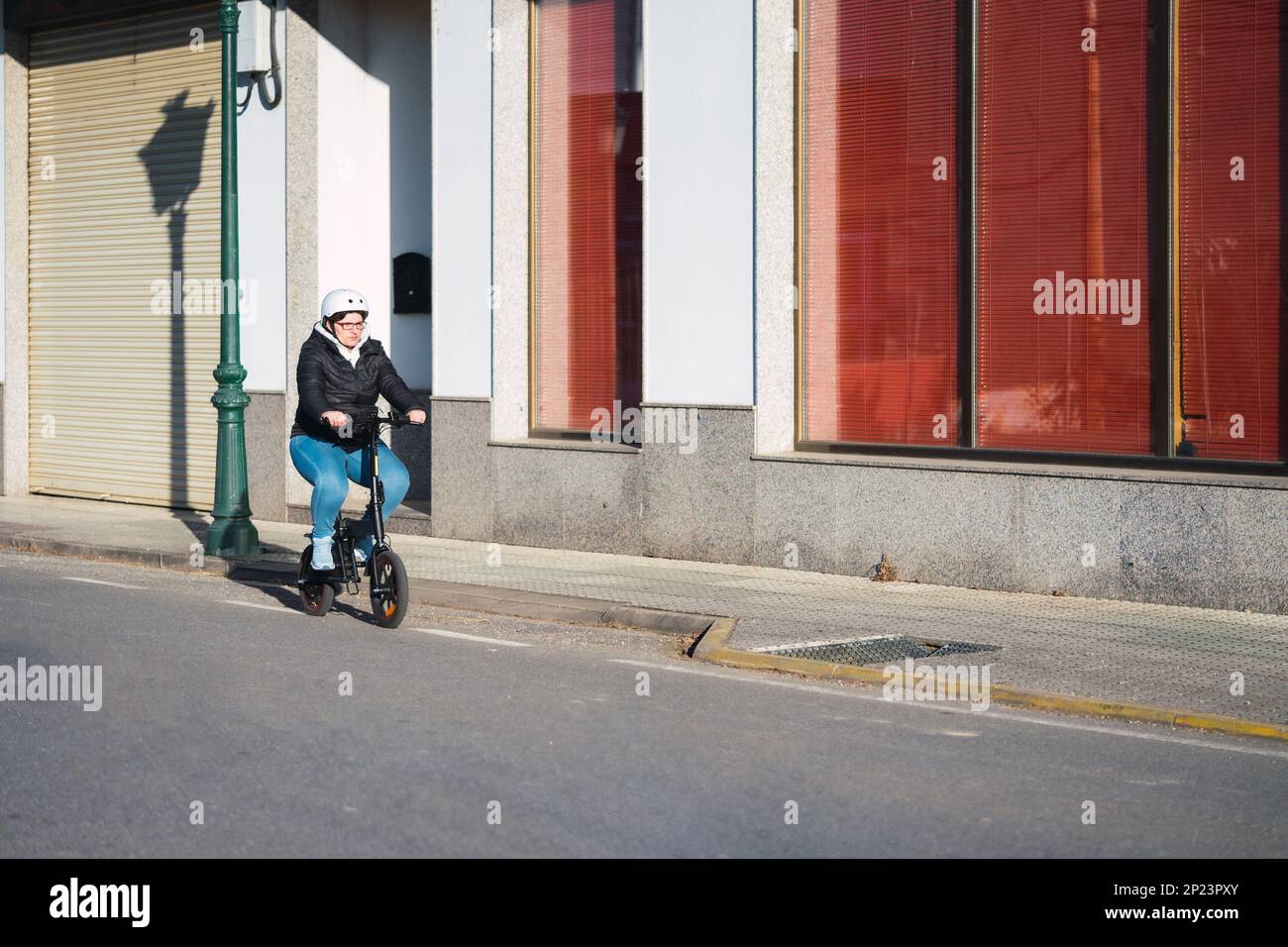 E scooter on bike lane hi-res stock photography and images - Alamy