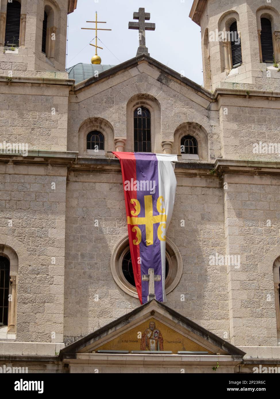 Serbian Orthodox Church flag in a church facade in Kotor Stock Photo ...
