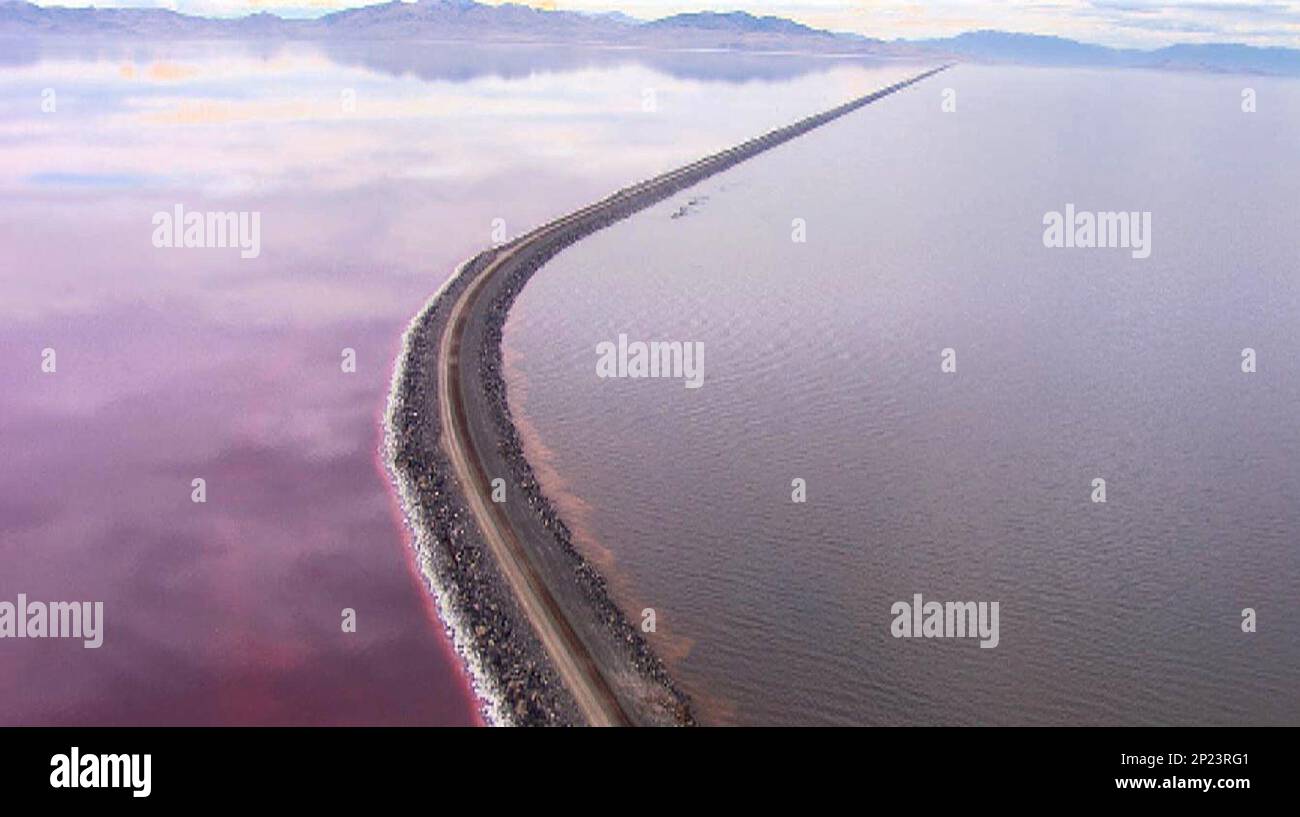This aerial image taken from video, shows the railroad causeway built ...