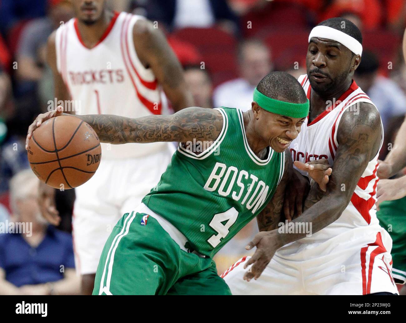 Boston Celtics' Isaiah Thomas (4) pushes against Houston Rockets' Ty ...