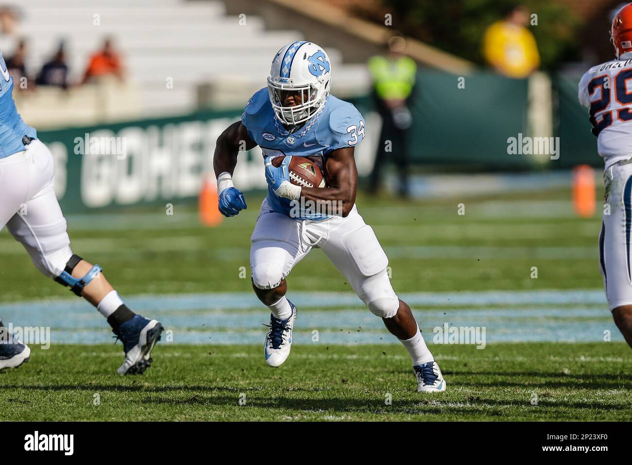 North Carolina Tar Heels running back Elijah Hood (34) finds a hole in ...