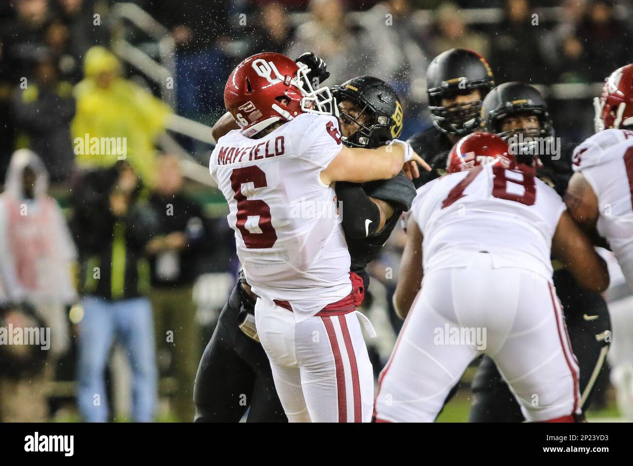 14 NOV 2015: Oklahoma Sooners quarterback Baker Mayfield (6) gets hit by Baylor Bears linebacker ...