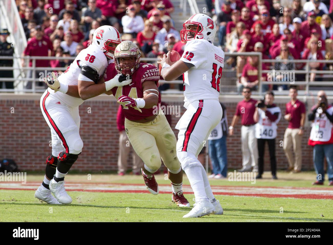 14 November 2015: NC State TE David J. Grinage (86) tries to hold off ...