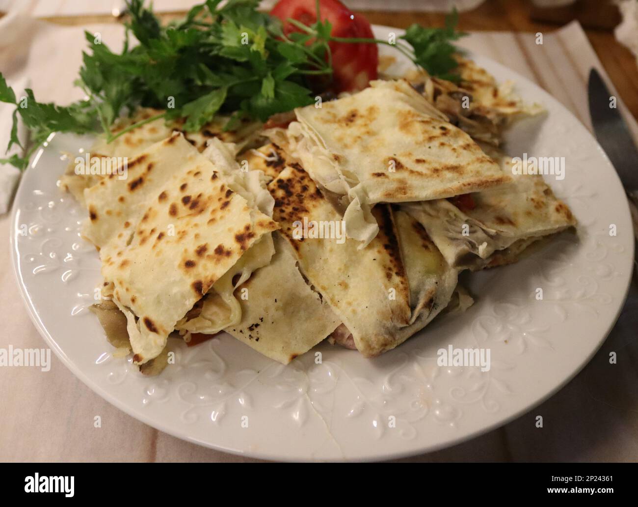 Traditional Turkish food, Turkish pancake gozleme with cheese and herb ...