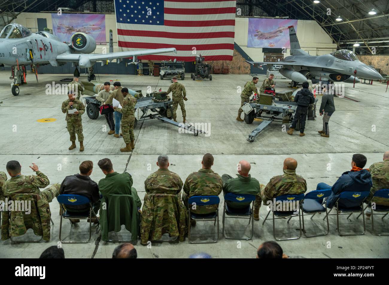 U.S. Air Force 51st Munitions Squadron Airmen construct 2,000-pound ...