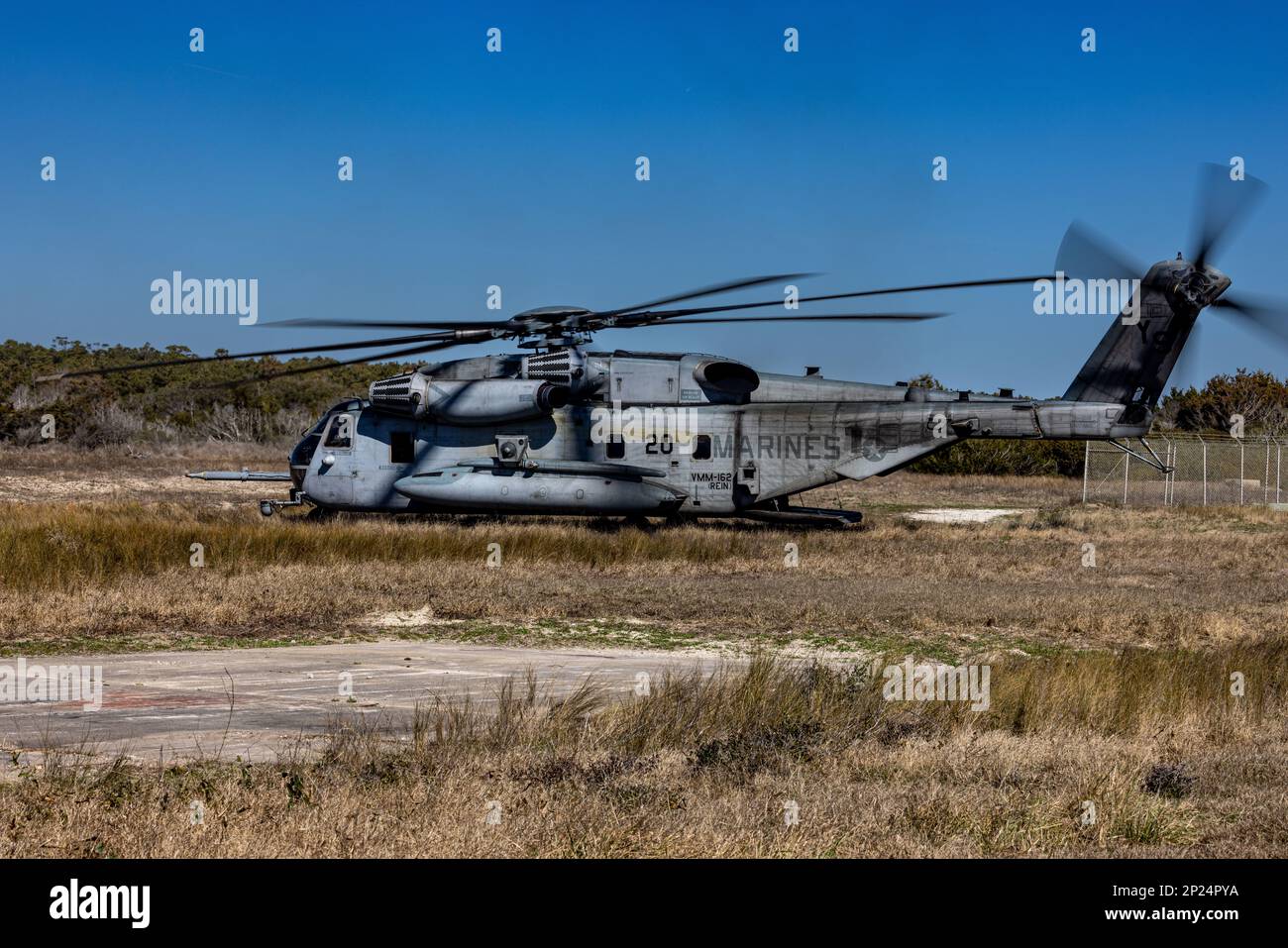 A U.S. Marine Corps CH-53E Super Stallion with Marine Medium Tiltrotor ...