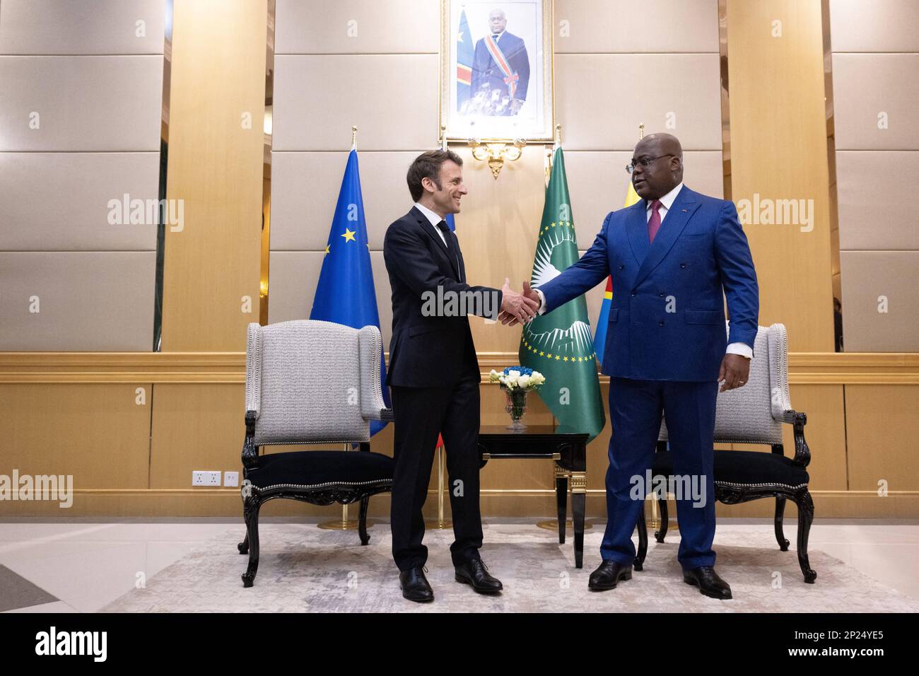 France's President Emmanuel Macron shakes hands with Democratic Republic of Congo's President ...