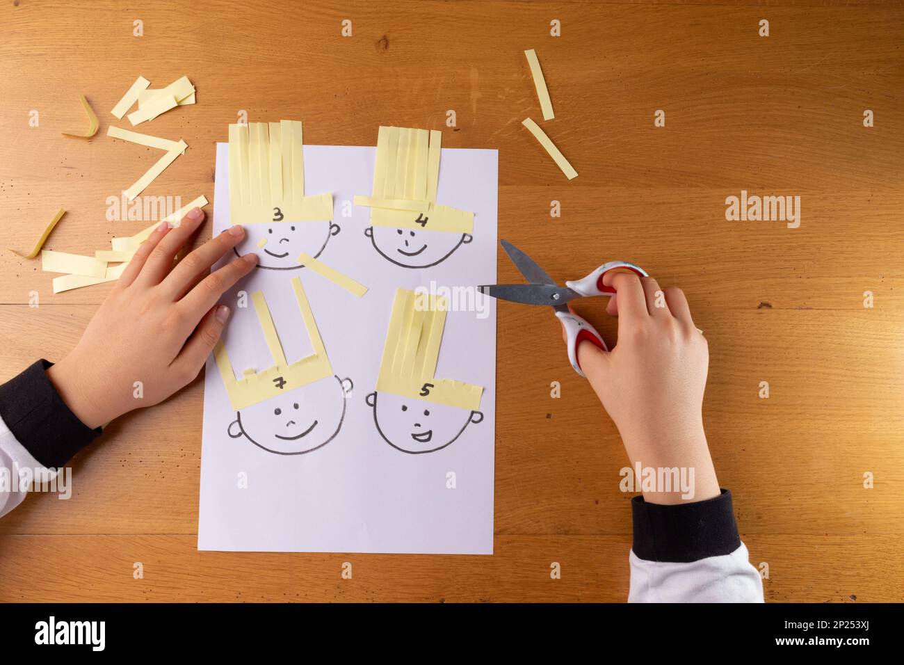 preschooler mathematics activity, kids hands cut paper with numbers ...
