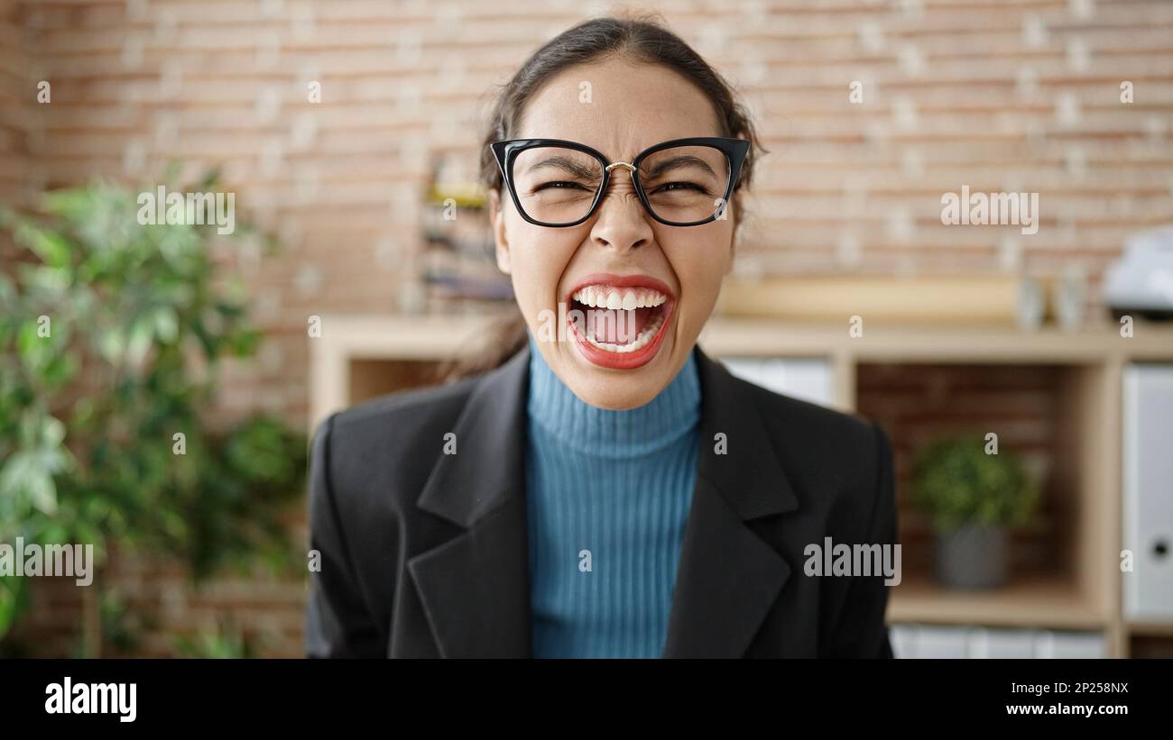 Angry hispanic business woman sitting hi-res stock photography and ...